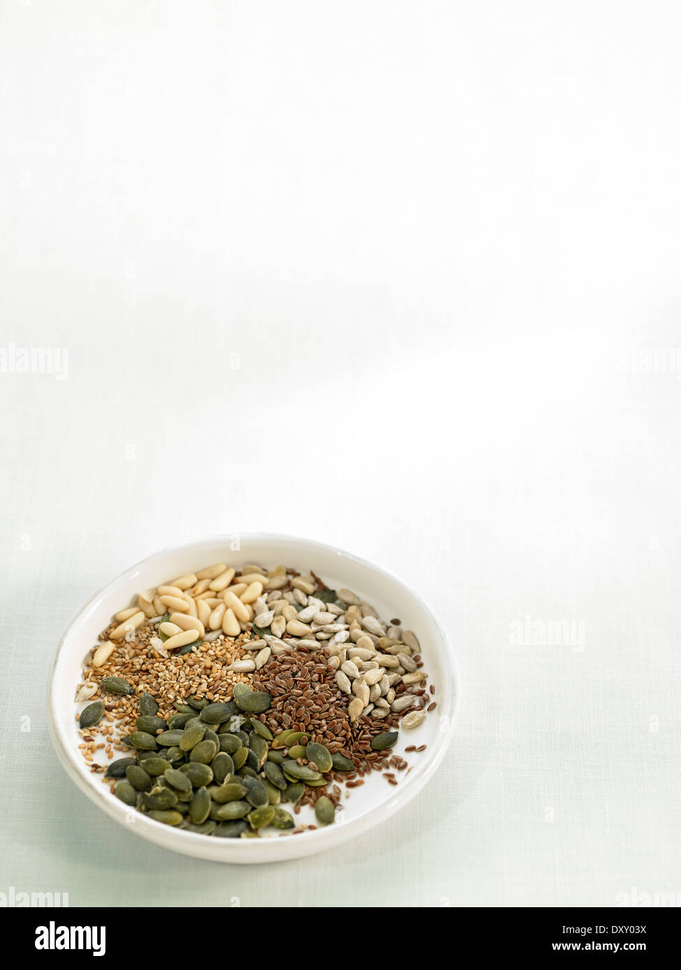 Small dish of seeds Stock Photo - Alamy