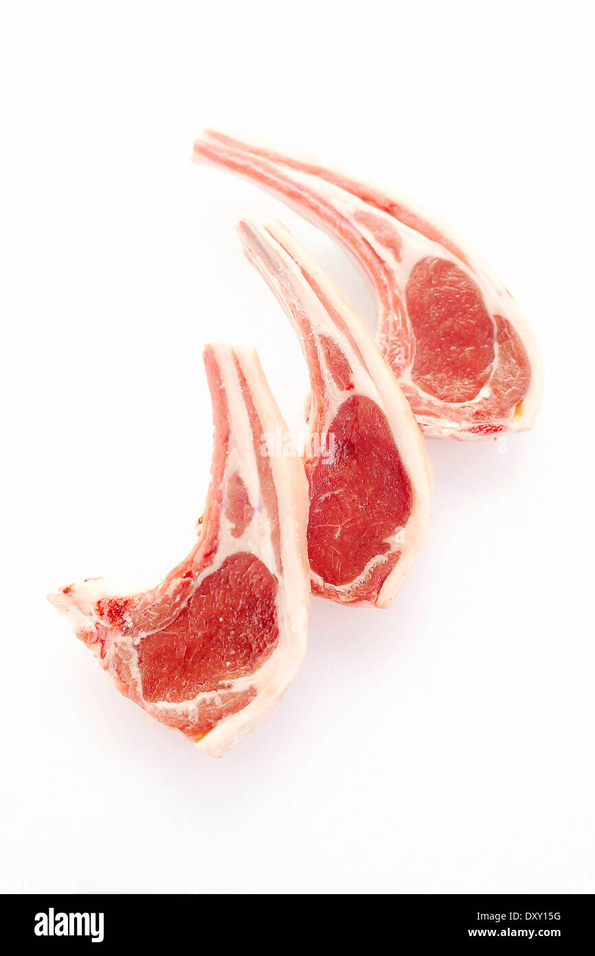 Cut-out raw lamb chops Stock Photo - Alamy
