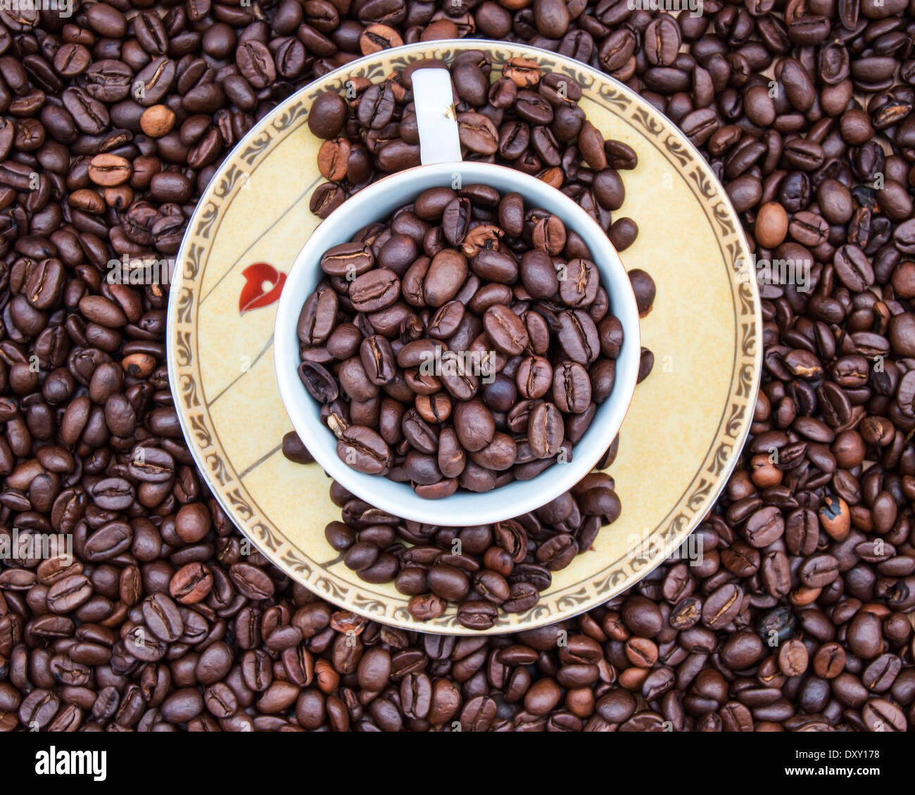 Cup with coffee beans Stock Photo - Alamy