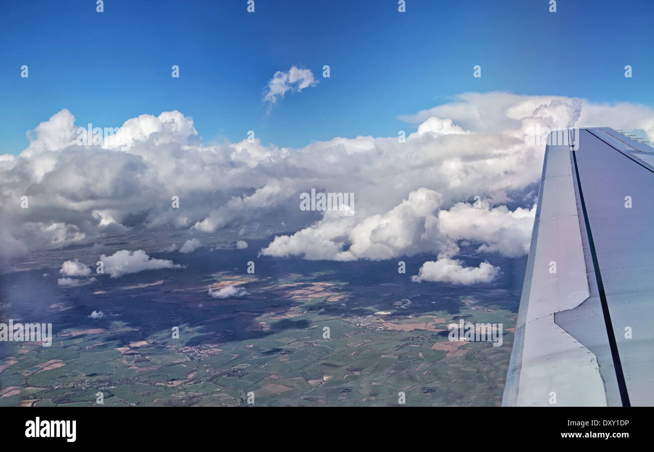 View out of airplane Airplane wing in flight Stock Photo - Alamy