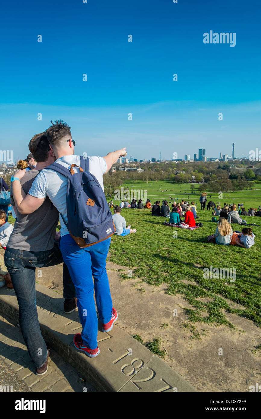 People looking out over London from Primrose Hill. London Stock Photo ...