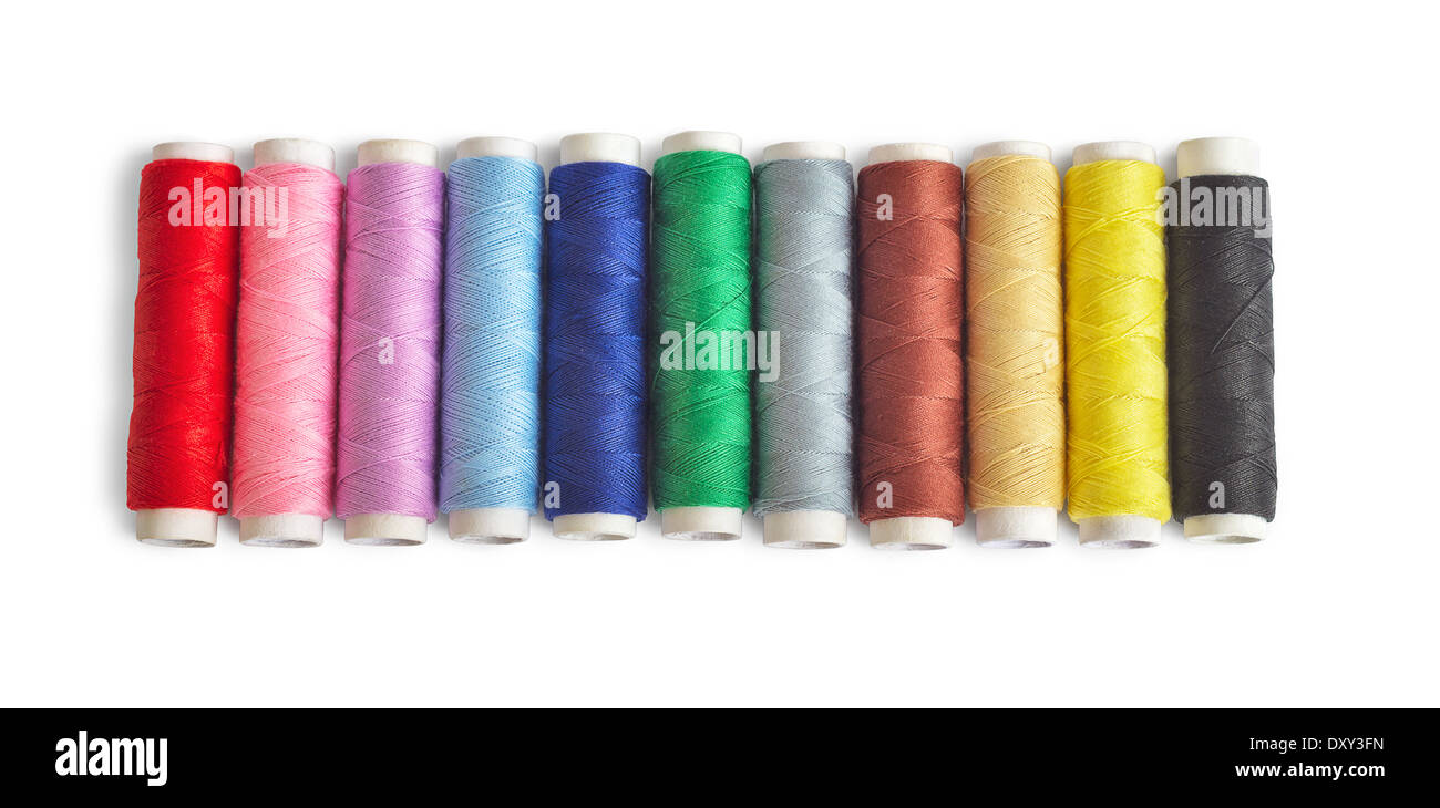 Colorful thread spools isolated on white background Stock Photo - Alamy