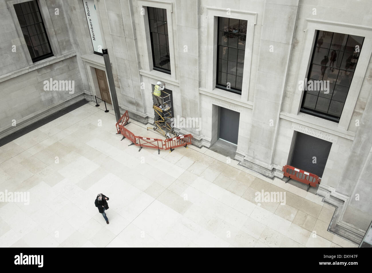 Worker carries out maintenance work at the British Museum in London ...