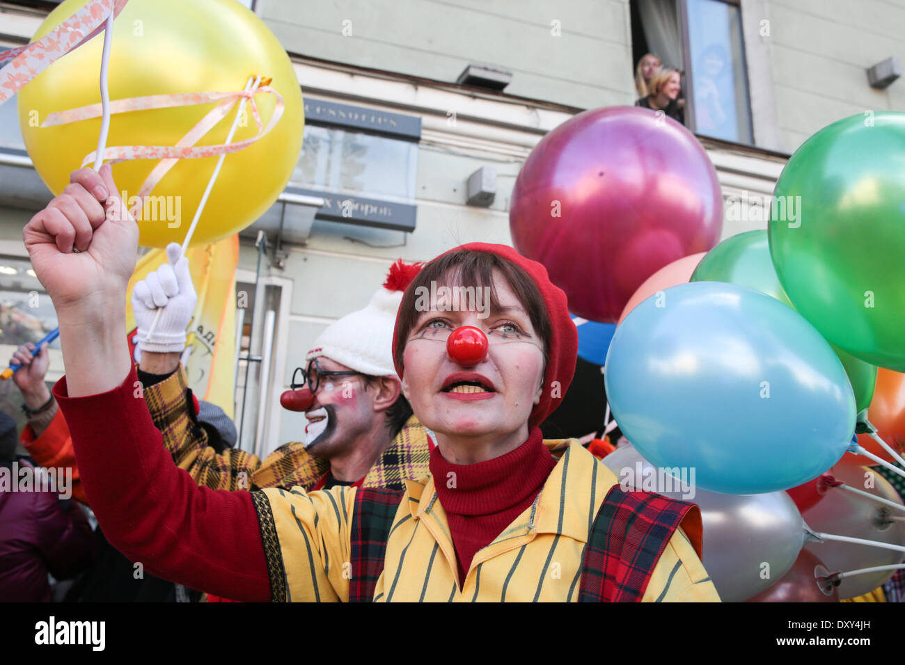 Saint Petersburg, Russia - April 1, 2014: Clowns with balloons walk ...