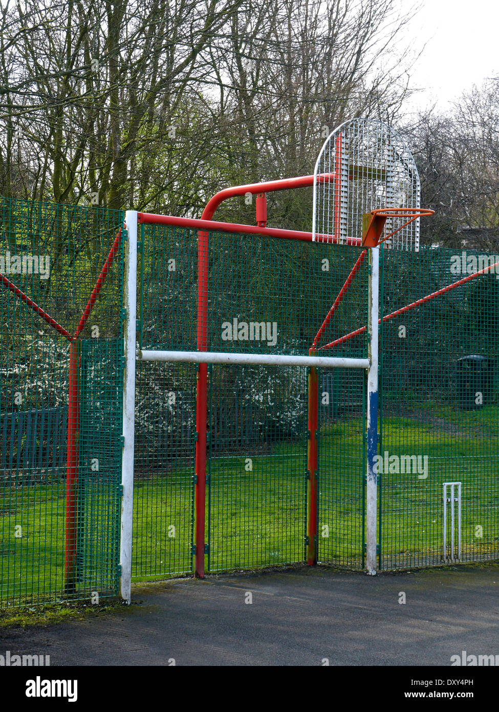 Basketball hoop on playing field UK Stock Photo - Alamy