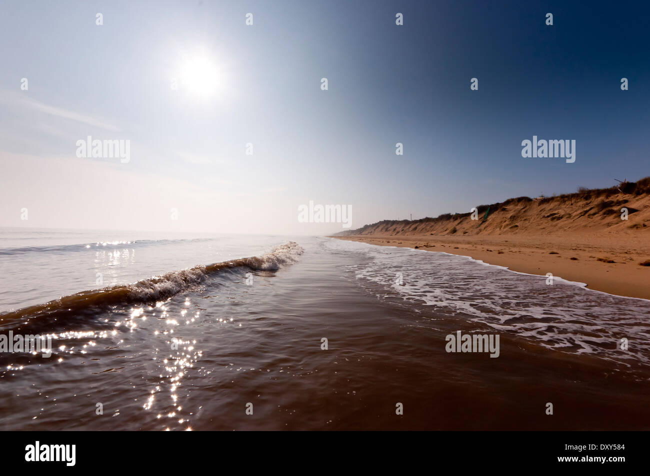 Norfolk beach sandy sunny sand sun sea waves Hemsby England UK Stock ...