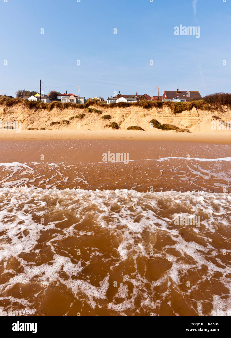 Hemsby beach Norfolk sand beach chalets coastal erosion Stock Photo - Alamy