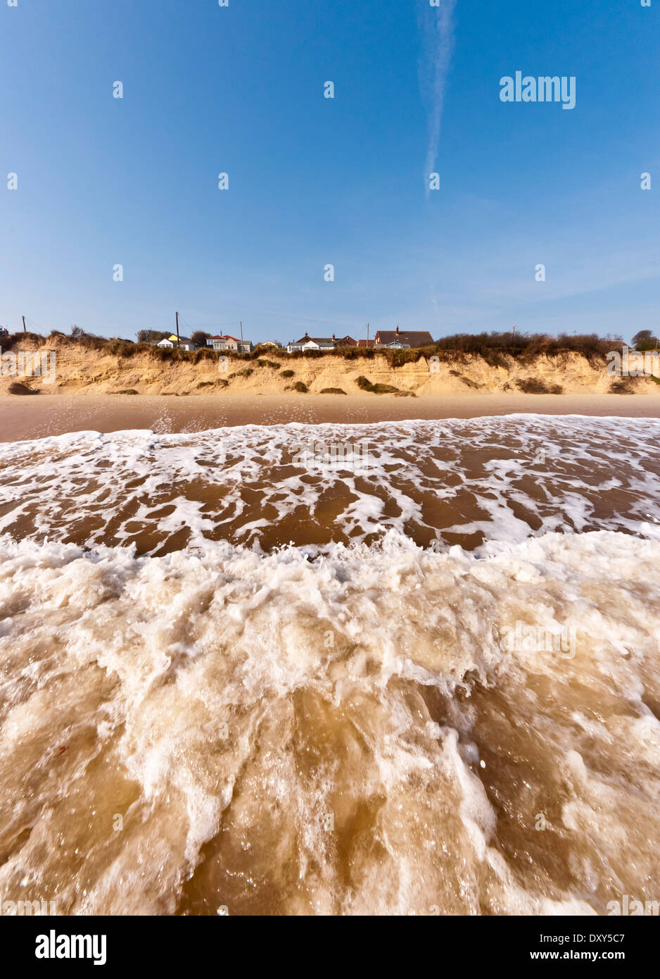 Hemsby beach Norfolk sand beach chalets coastal erosion Stock Photo - Alamy