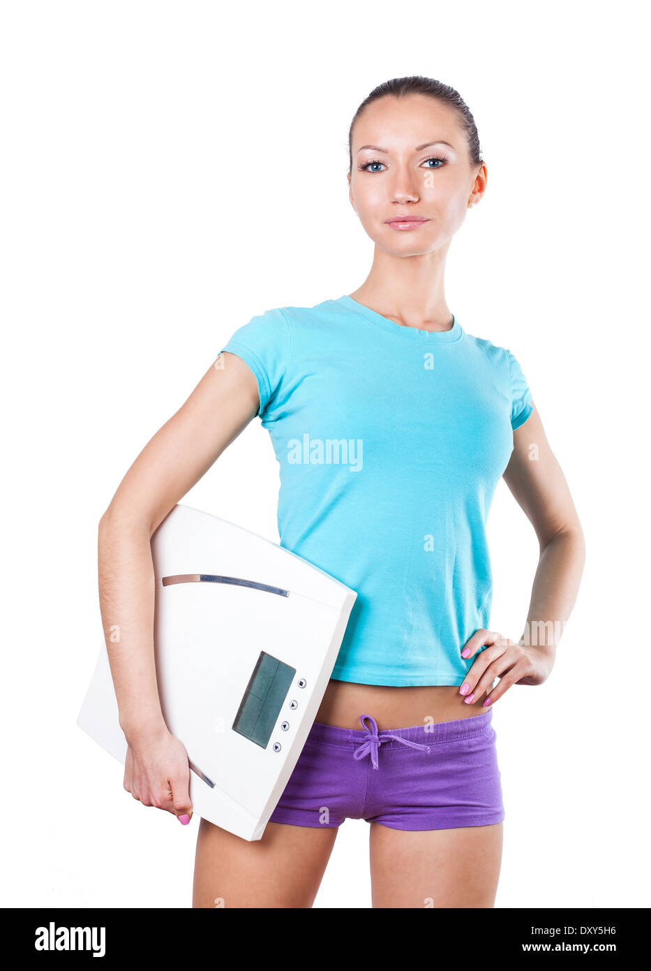 Diet and sport concept - young sporty woman with scale on white ...