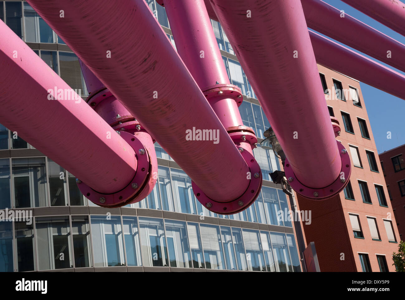 Temporary pink tubes in front of a modern building at Postdamer Platz ...