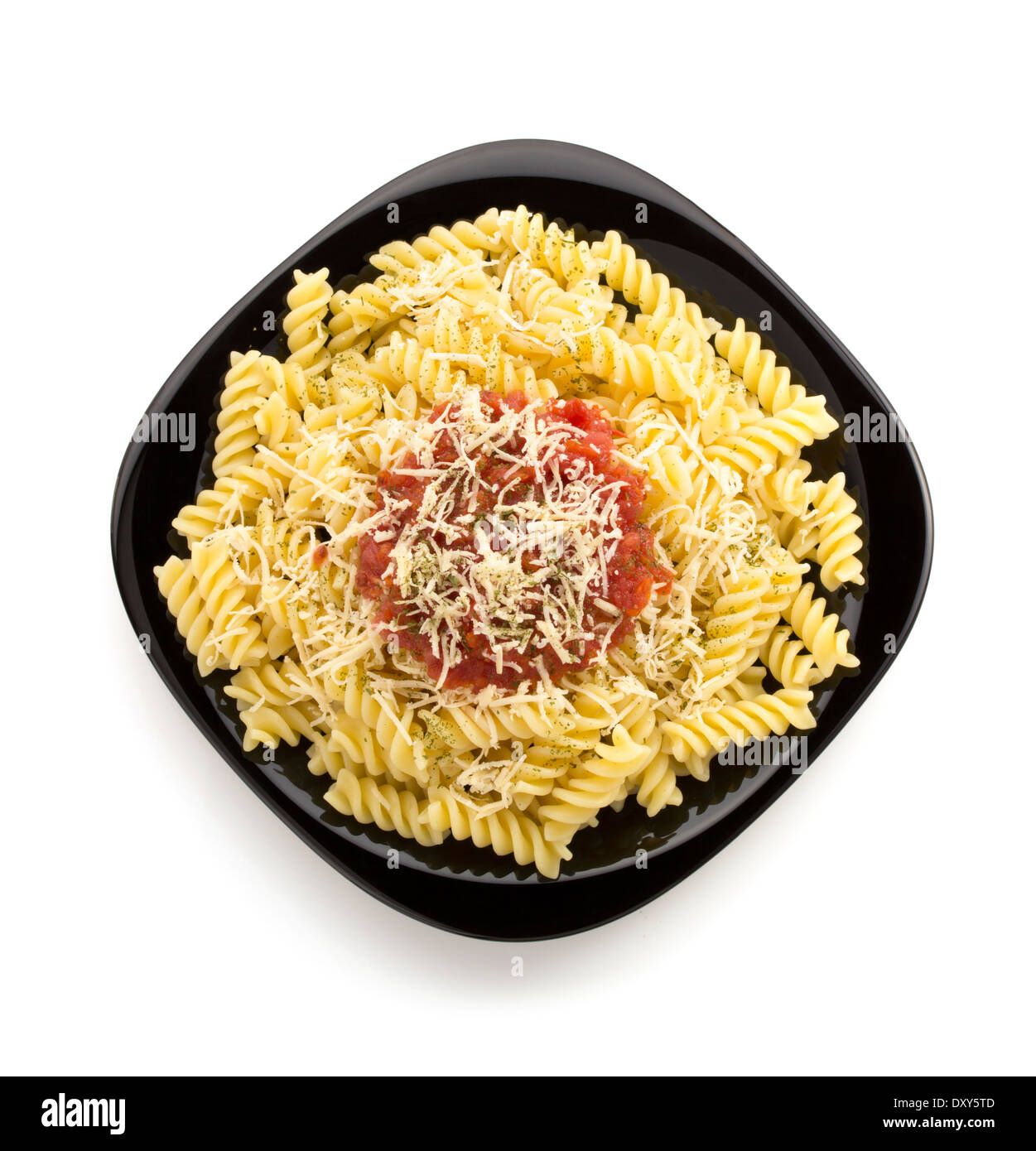 pasta fusilli in plate isolated on white background Stock Photo - Alamy