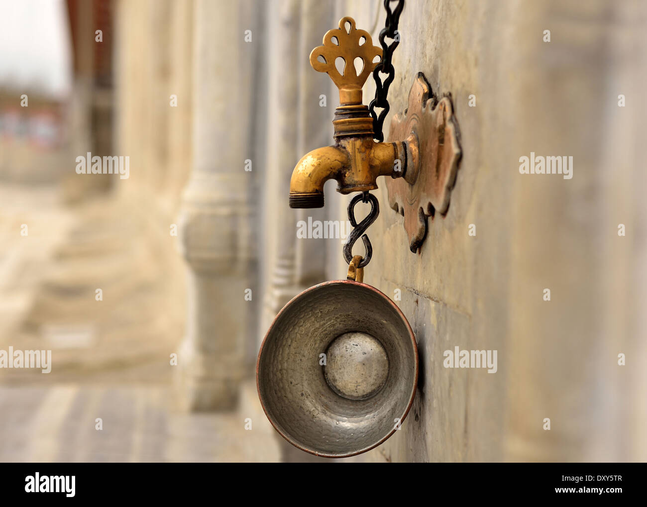 Antique Turkish faucet on wall Stock Photo - Alamy