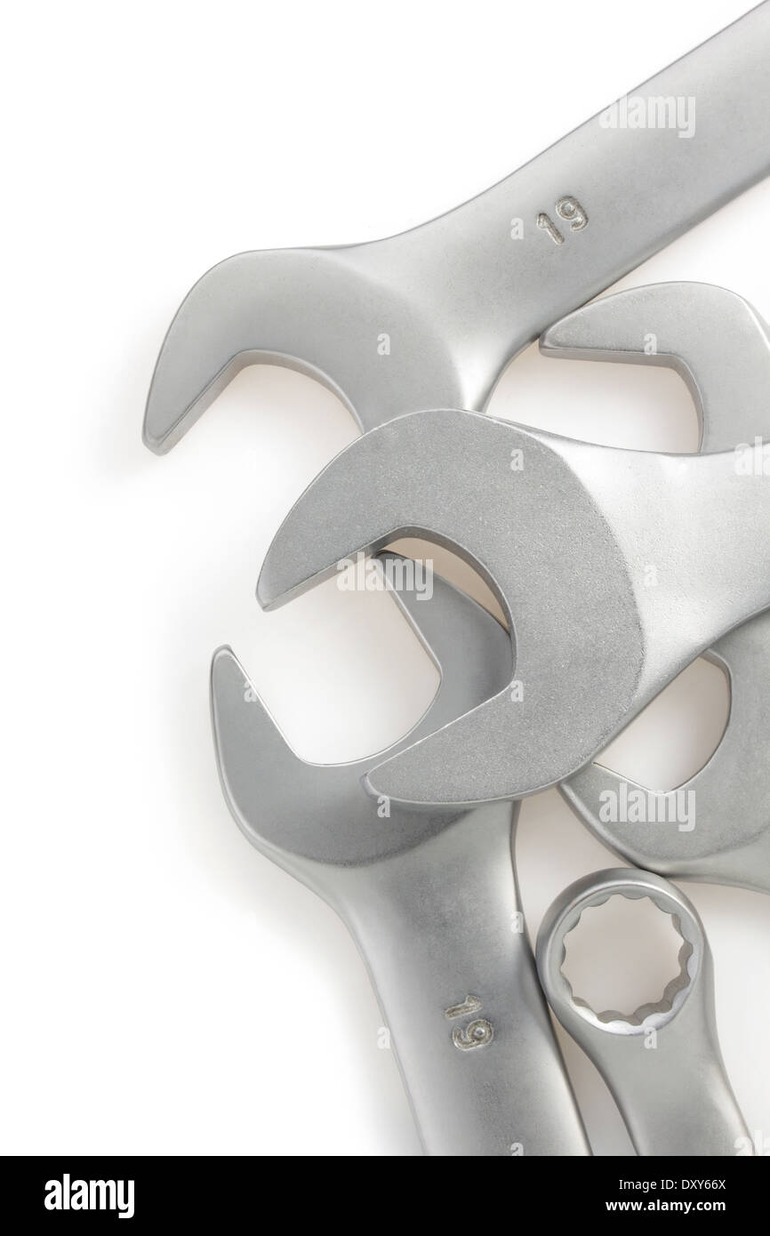 wrench tool and nut isolated on white background Stock Photo - Alamy