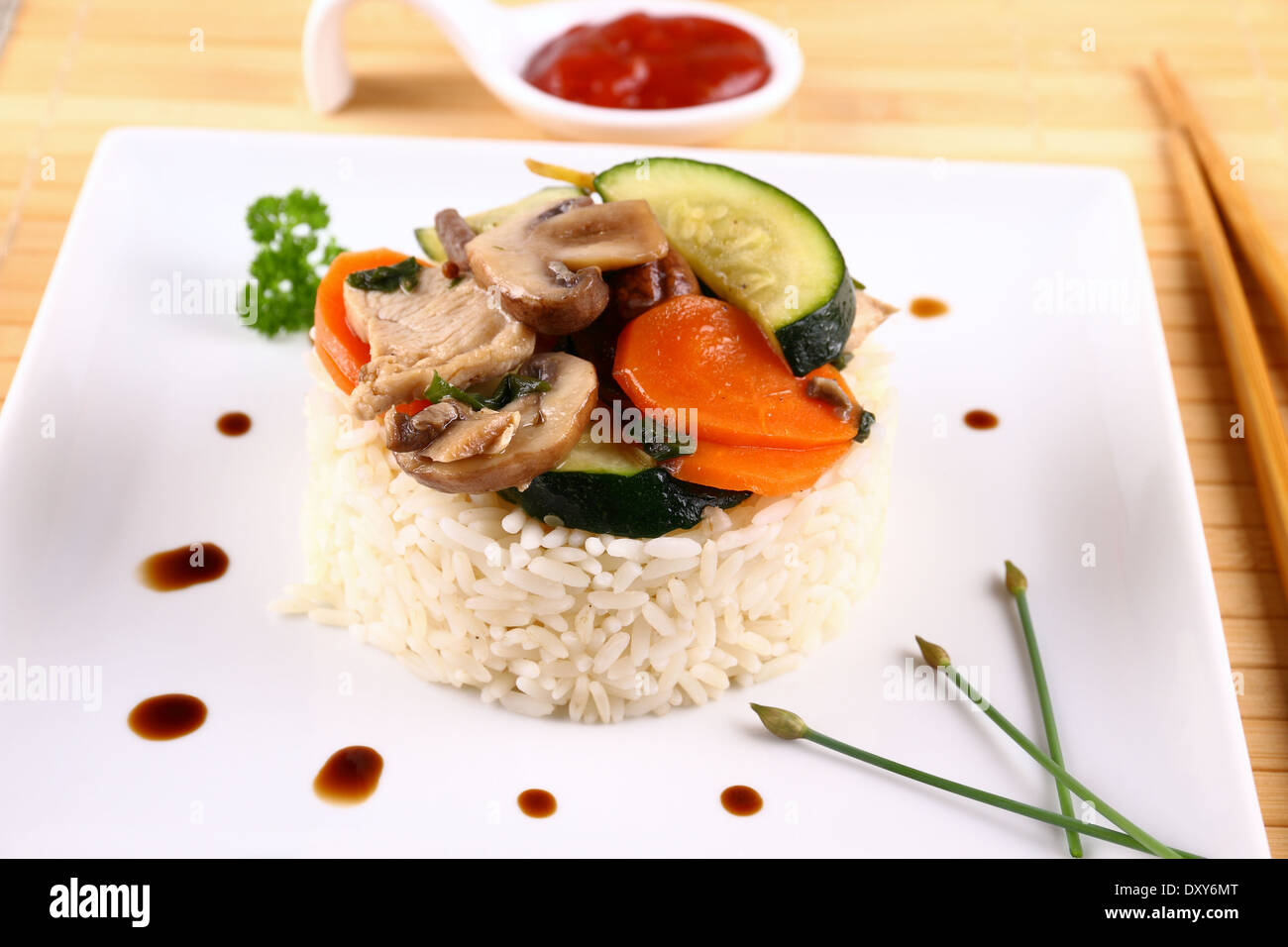Chicken meat, asian rice, zucchini, carrots, close up Stock Photo - Alamy