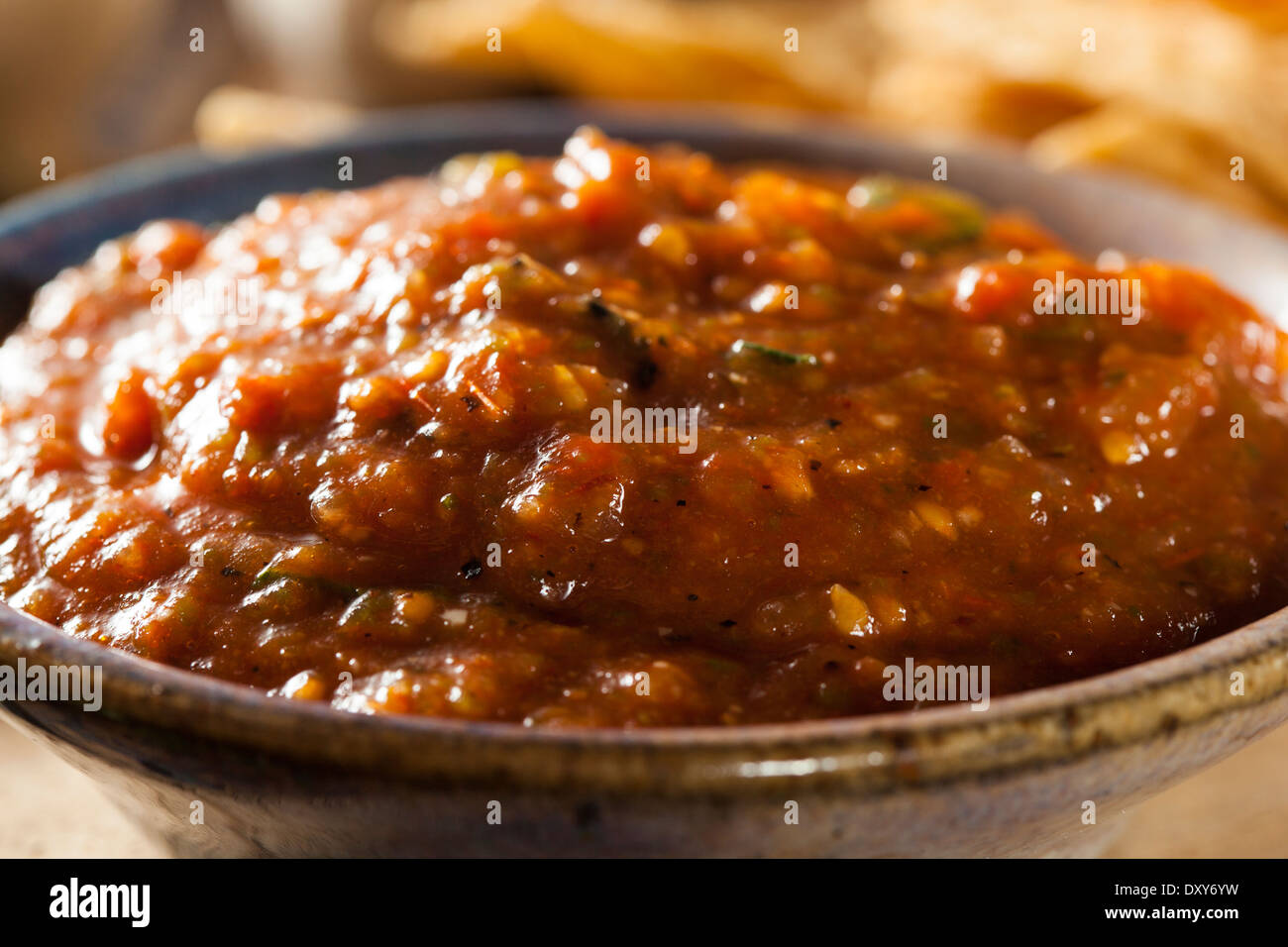 Organic Red Spicy Salsa with Tortilla Chips Stock Photo - Alamy
