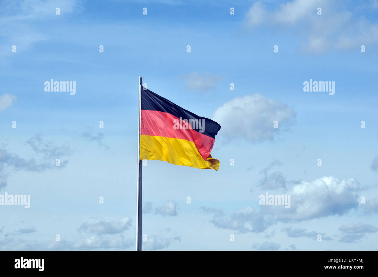 german flag in blue sky Stock Photo - Alamy