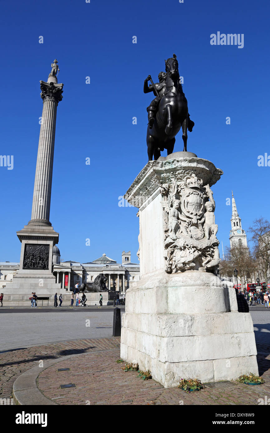 Nelson's Column and statues of King Charles I in Trafalgar Square ...