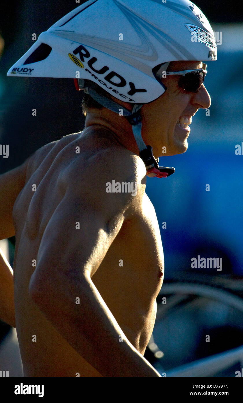 man cycling in triathlon at Ft Desoto Florida Stock Photo - Alamy
