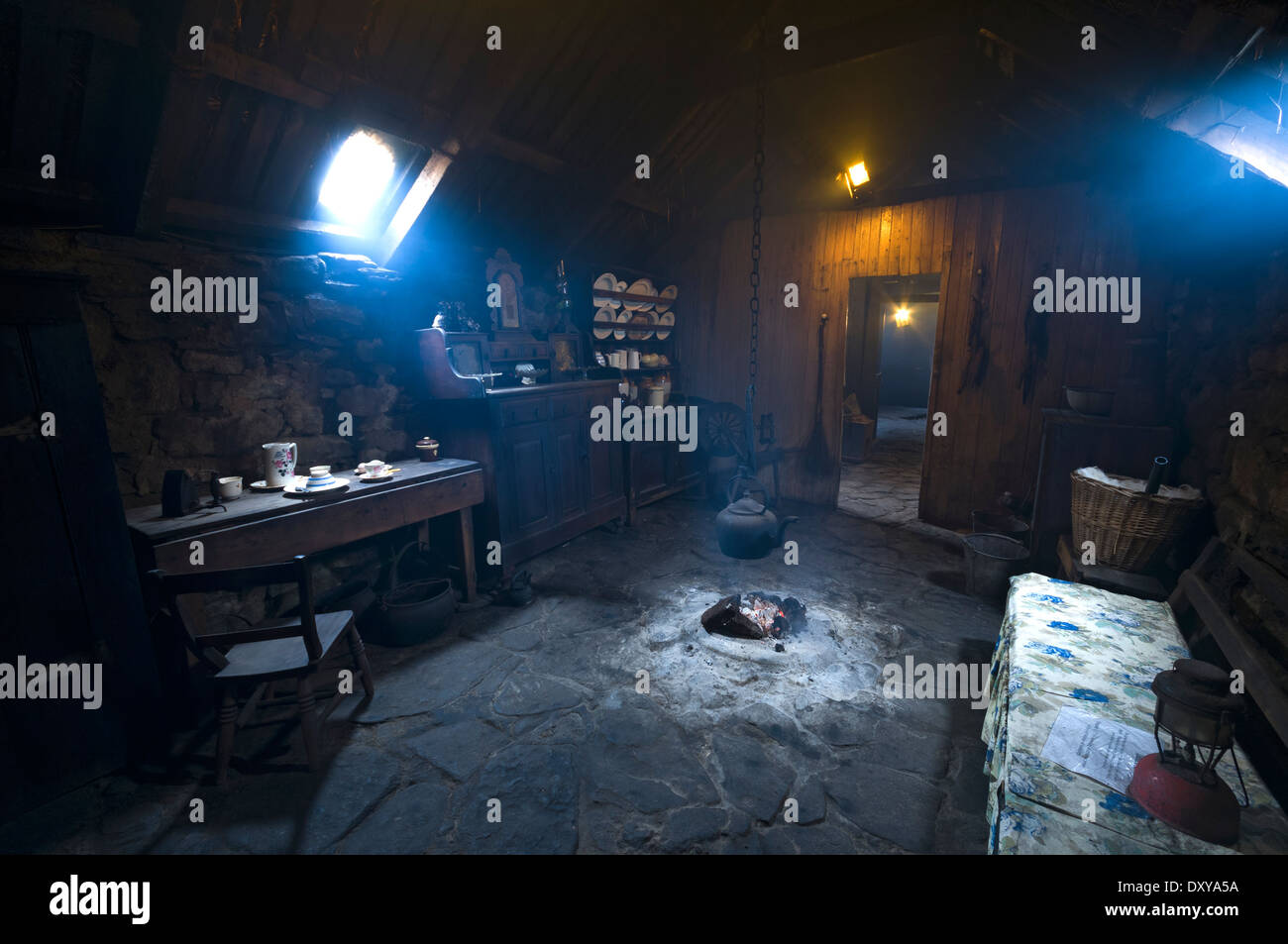The living room in the blackhouse at Arnol, Isle of Lewis, Western Isles, Scotland, UK, showing ...