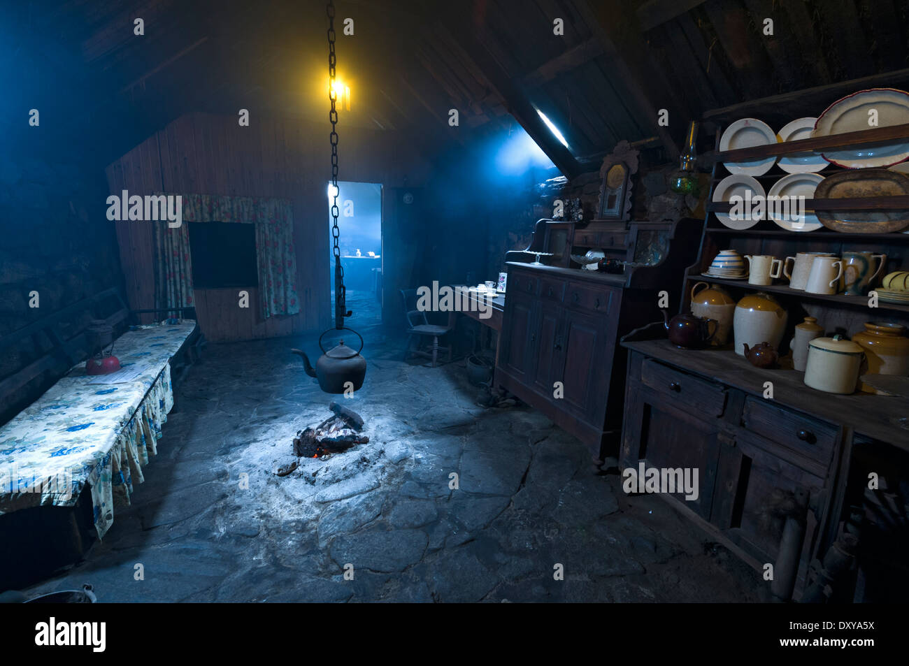 The living room in the blackhouse at Arnol, Isle of Lewis, Western Isles, Scotland, UK, showing ...