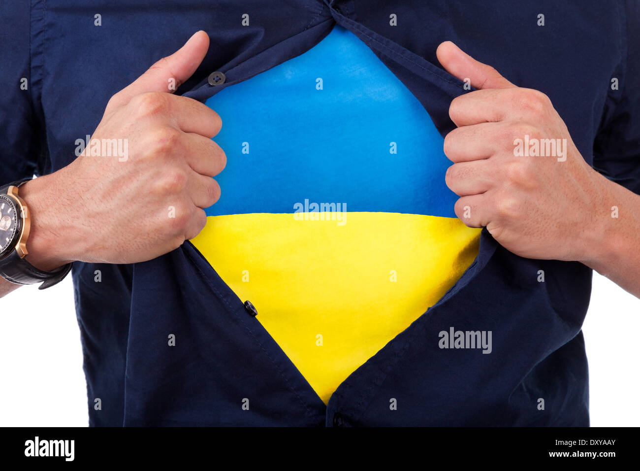 Young sport fan opening his shirt and showing the flag his country ...