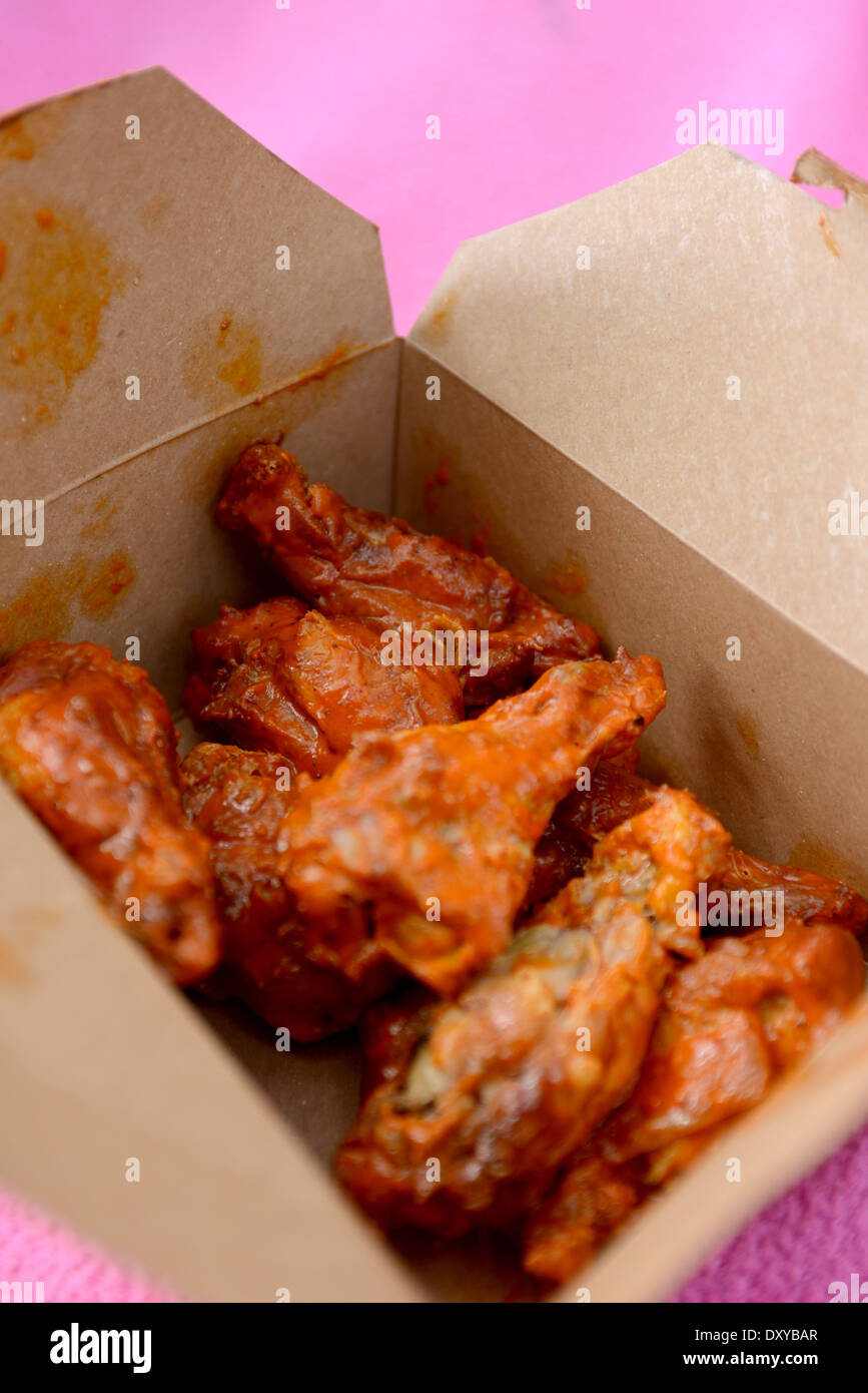 Messy chicken wings hi-res stock photography and images - Alamy