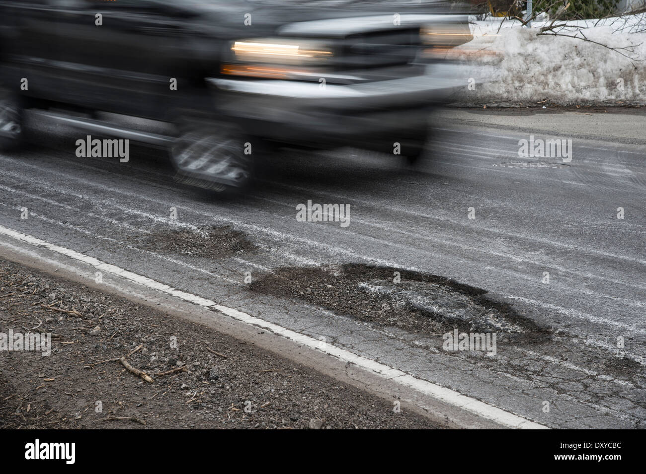 Pothole In Road Stock Photo - Alamy