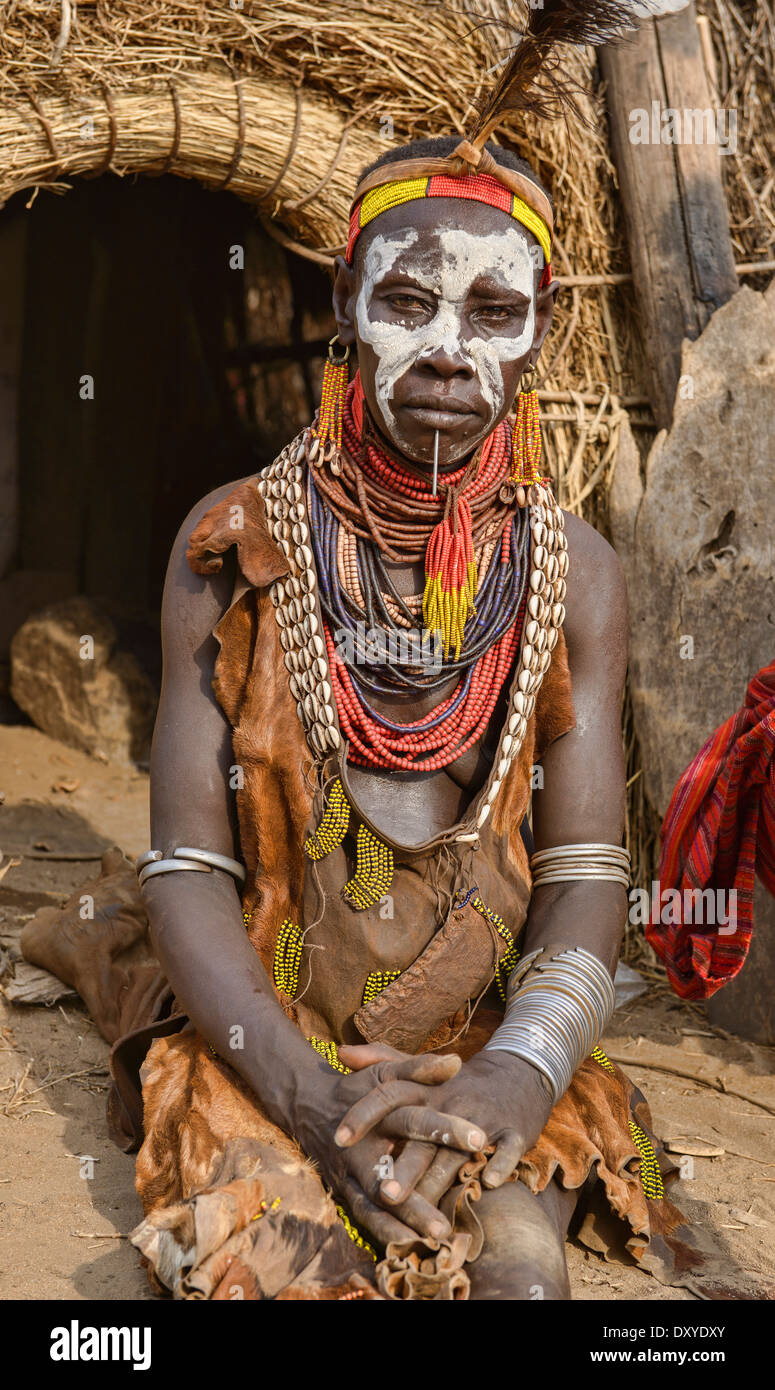 colorful Karo woman in front of her hut in Kolcho, Omo Valley, Ethiopia ...