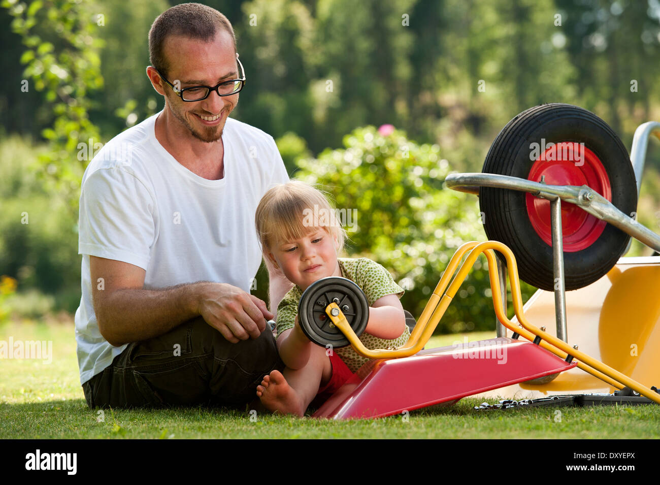 Child imitating parent hi-res stock photography and images - Alamy