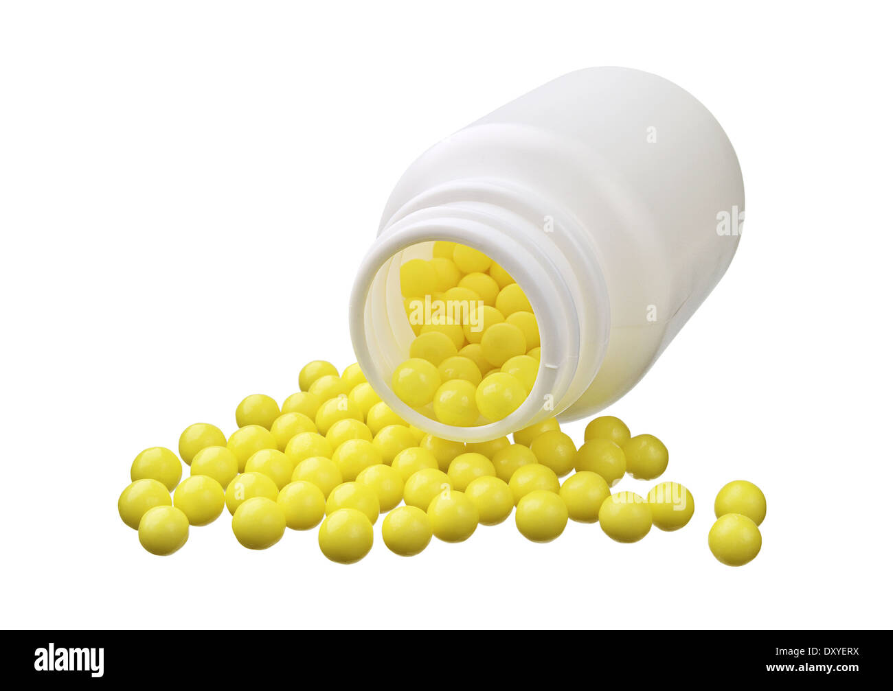 Pot of yellow vitamin isolated on a white background Stock Photo - Alamy