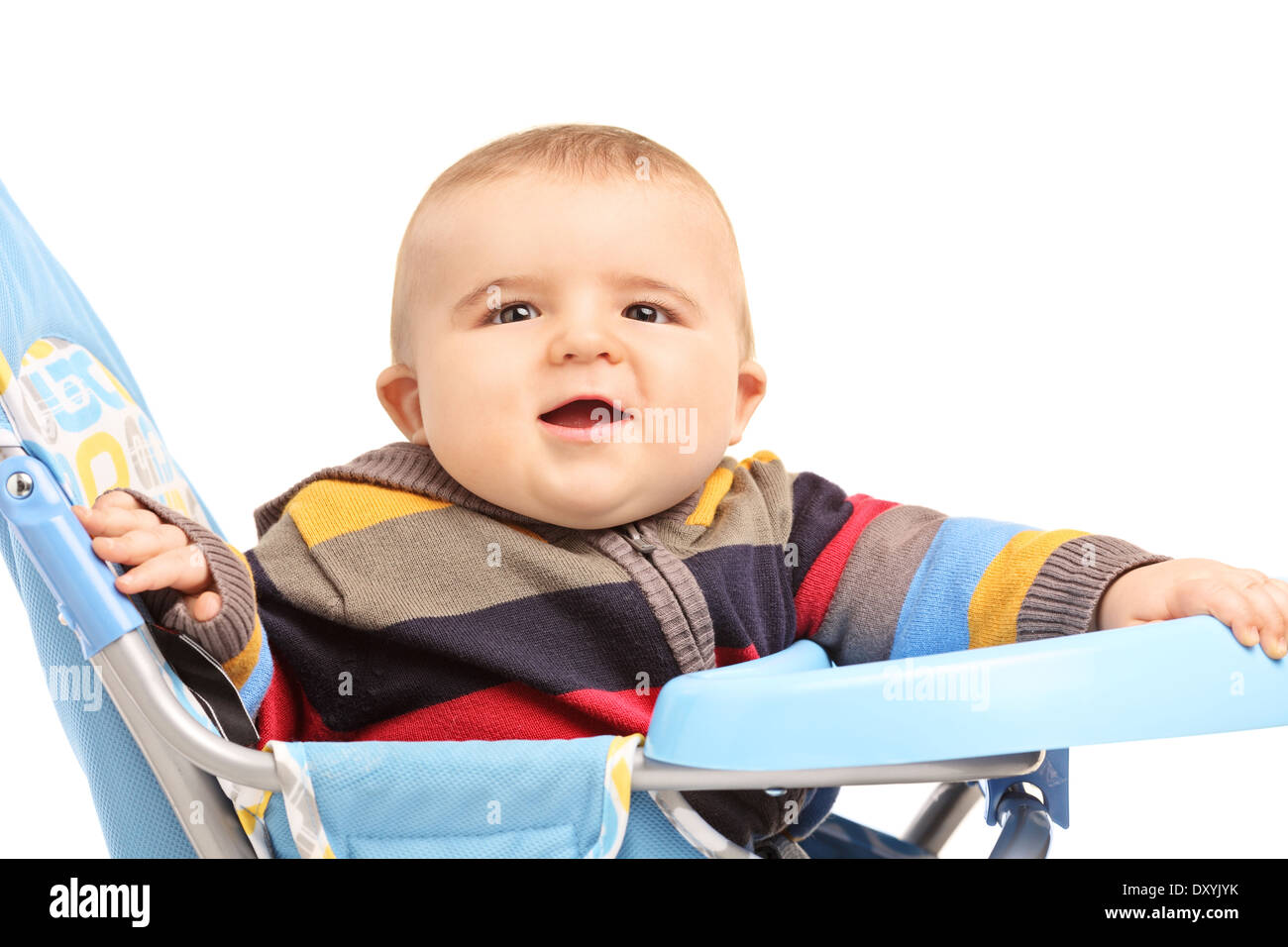 Little boy sitting in a baby stroller Stock Photo - Alamy