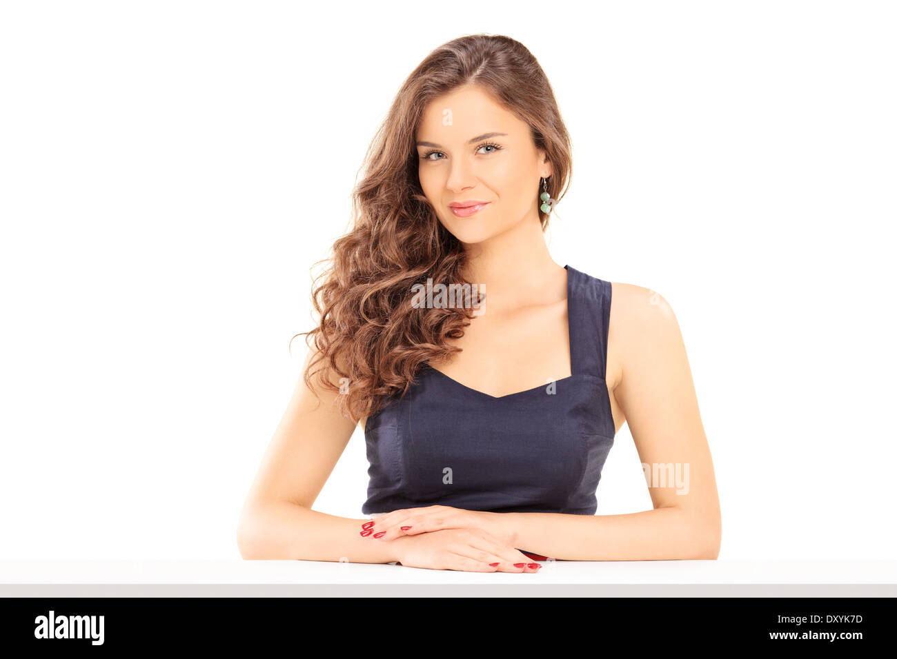 Beautiful woman sitting table hi-res stock photography and images - Alamy