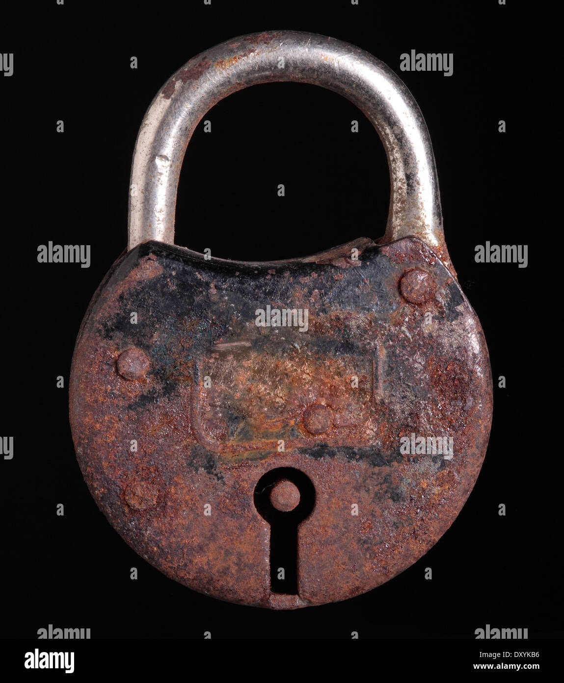 old and rustic padlock Isolated on black Stock Photo - Alamy