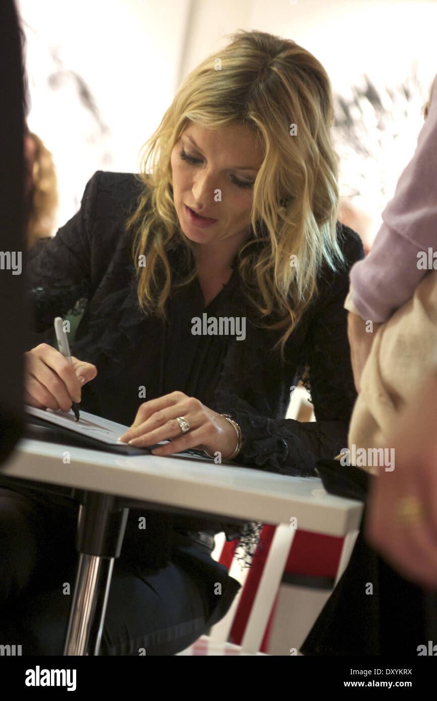 Kate Moss signs copies of "The Kate Moss Book" at Colette's store ...