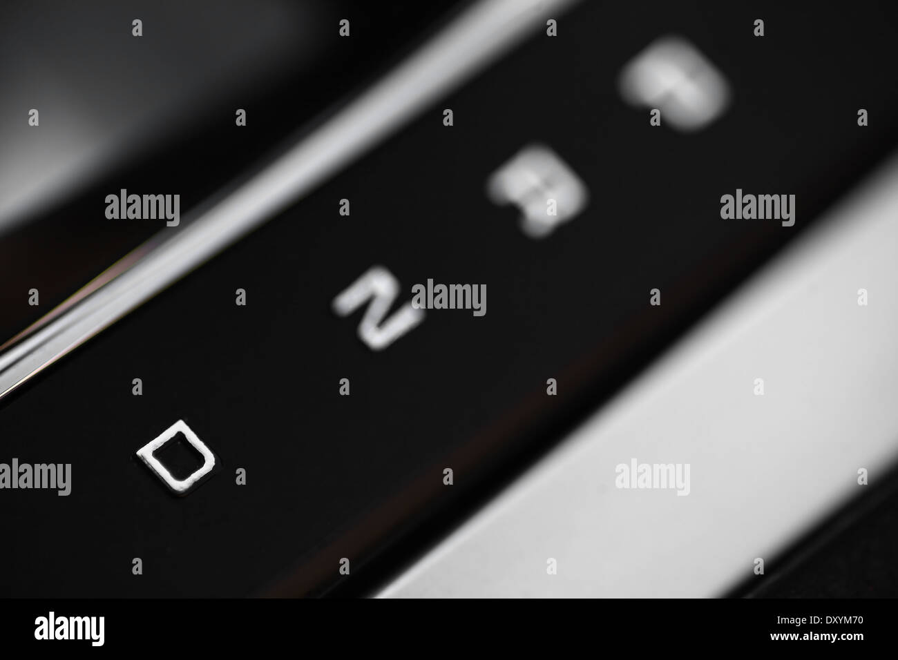 Close-up shot of the positions of an automatic gear shifter in a car ...