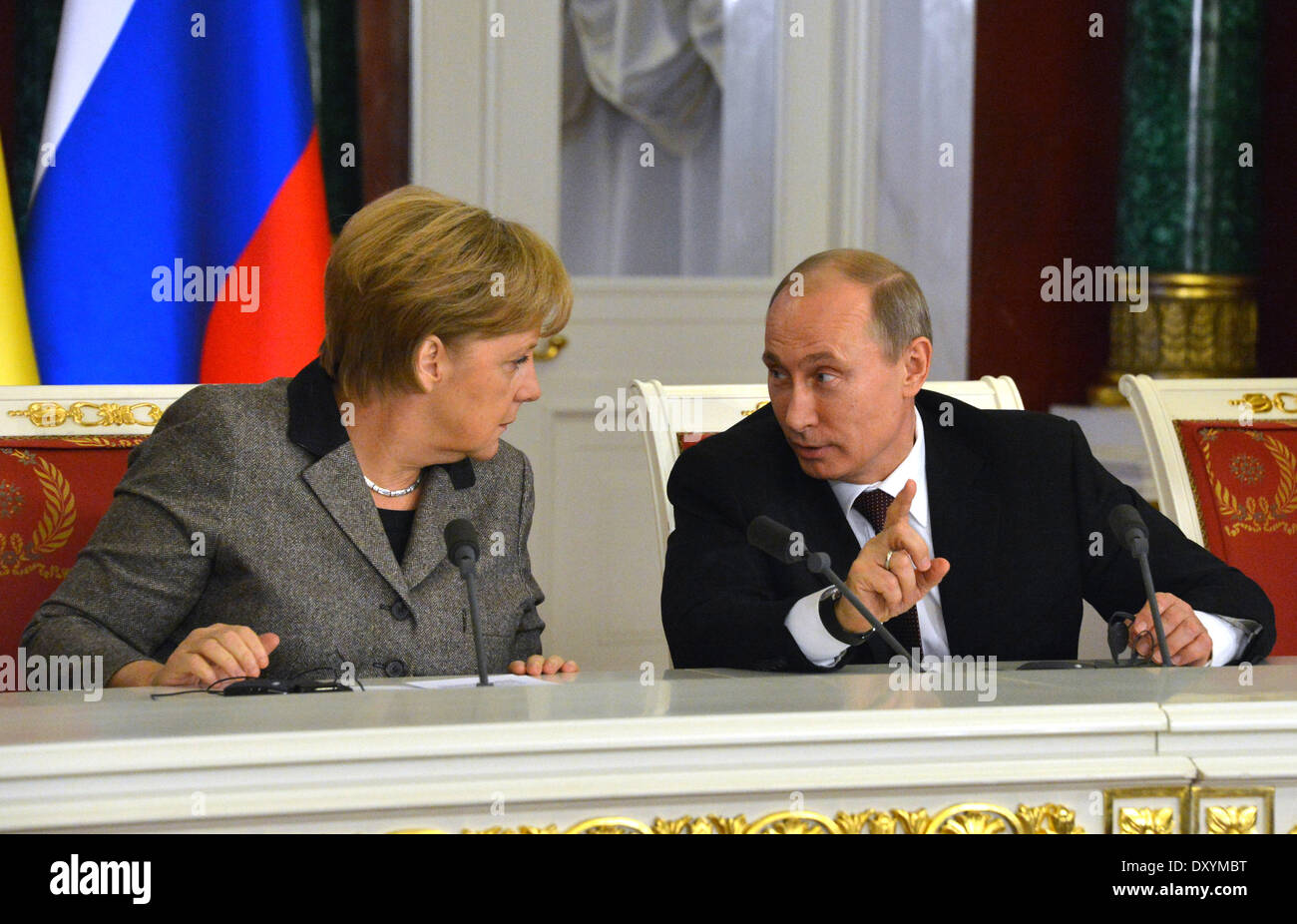 Russian President Vladimir Putin and German Chancellor Angela Merkel ...