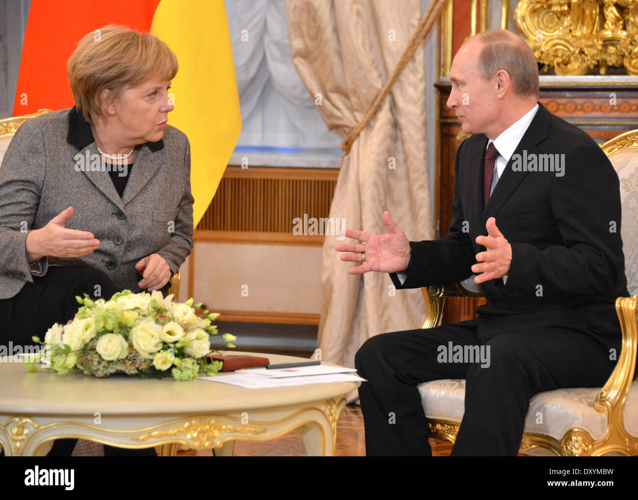 Russian President Vladimir Putin and German Chancellor Angela Merkel ...