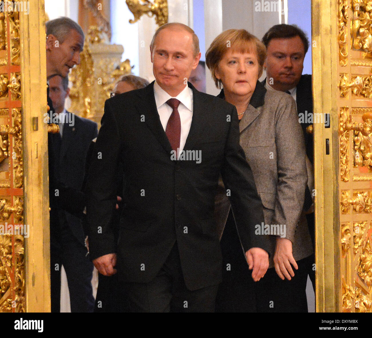 Russian President Vladimir Putin and German Chancellor Angela Merkel ...