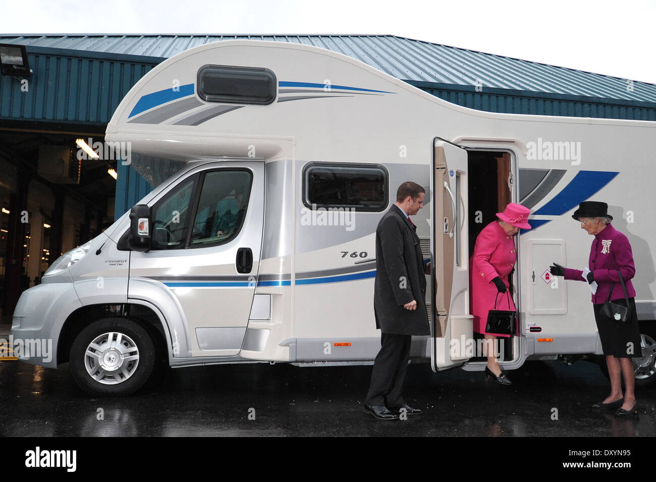 Britain's Queen Elizabeth accompanied by HRH The Duke of Edinburgh at ...