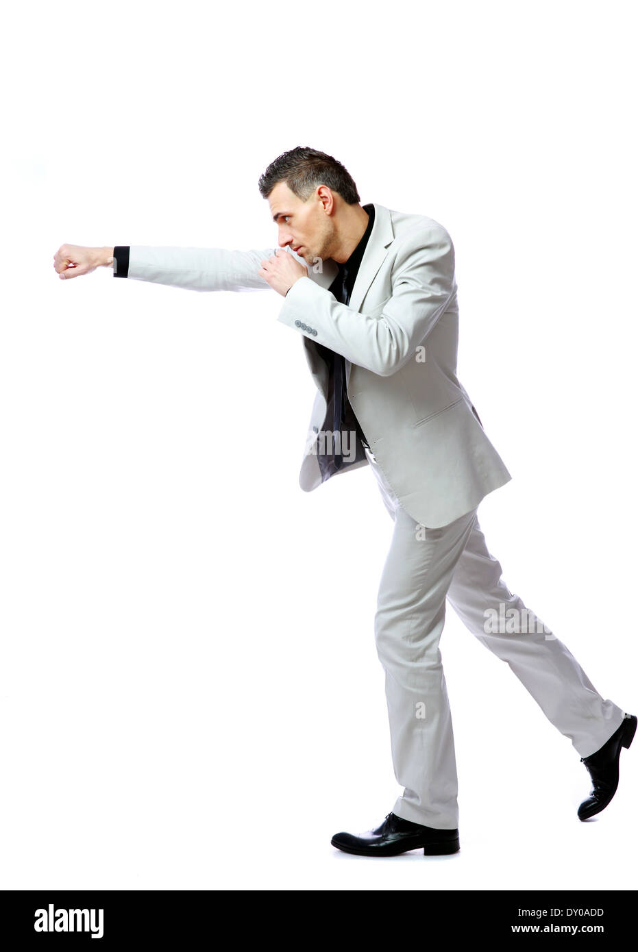 Side view portrait of a businessman punch Stock Photo - Alamy