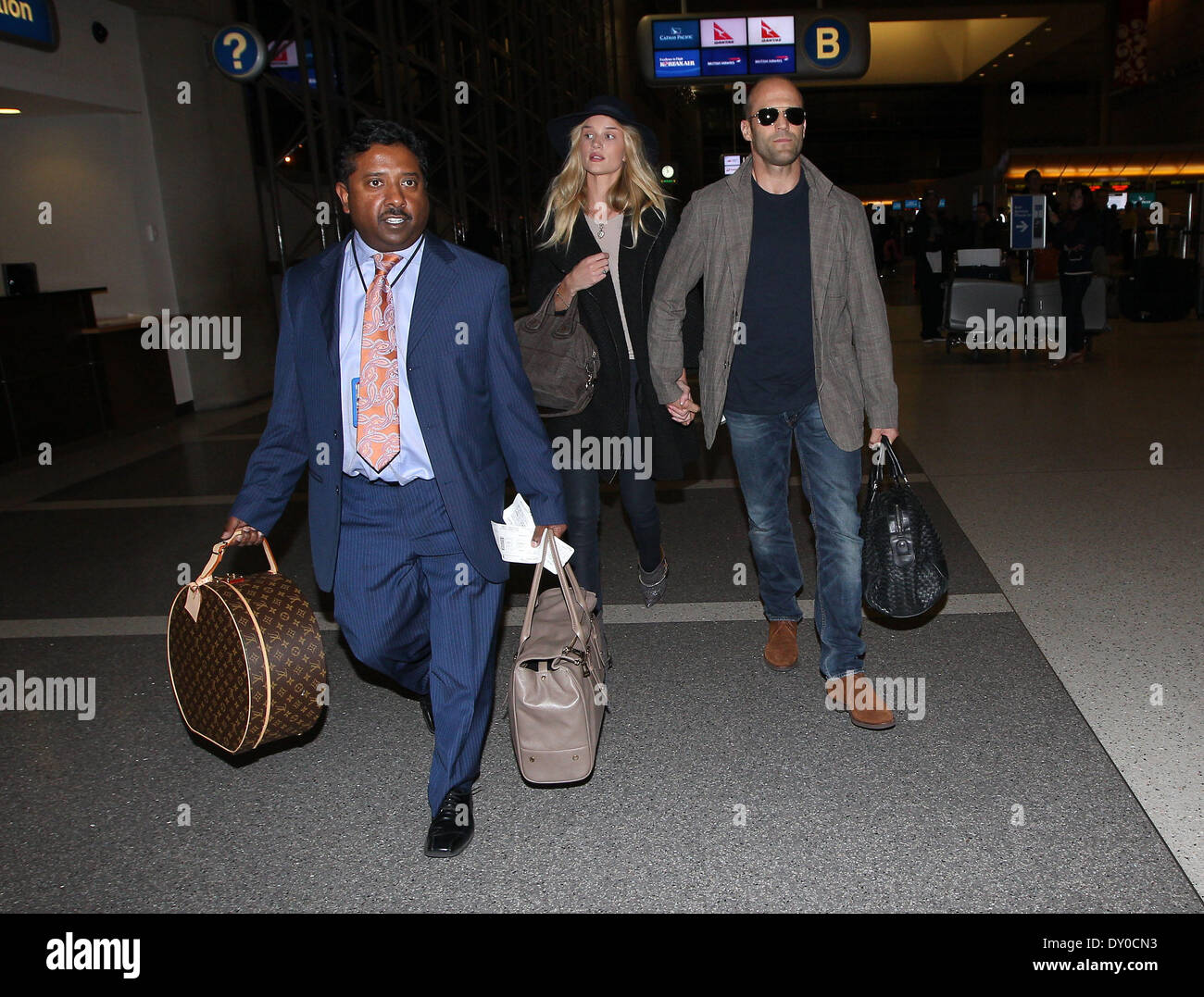 Jason Statham and his girlfriend Rosie Huntington-Whiteley arrive at ...