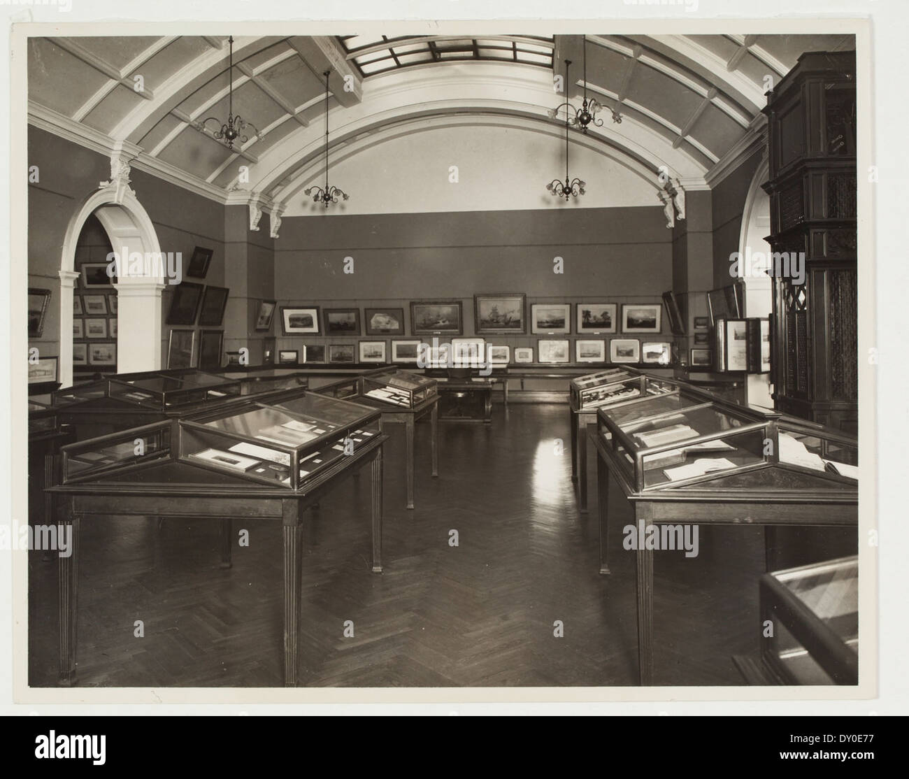 A 1935 photograph of the reading rooms at Mitchell Library, showcasing ...