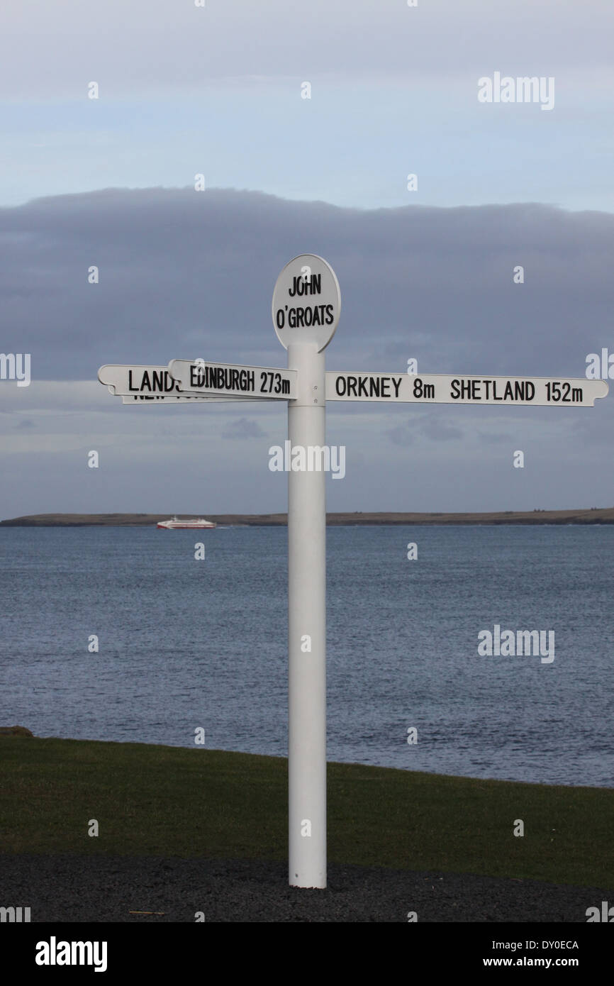 Famous John O'Groats Distance sign and Pentland Ferries MV Pentalina ...