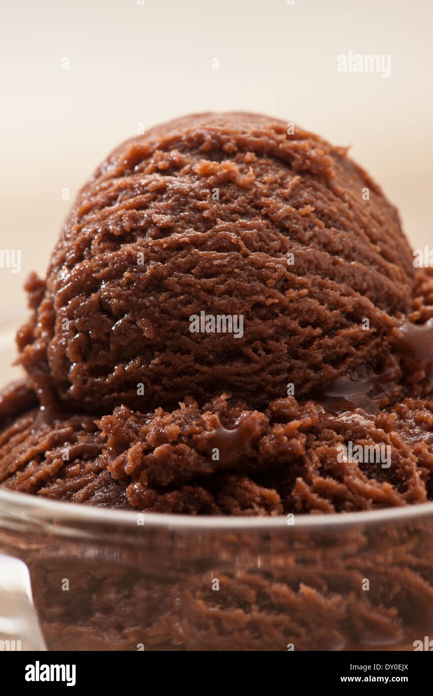 chocolate ice cream over a beige background Stock Photo - Alamy
