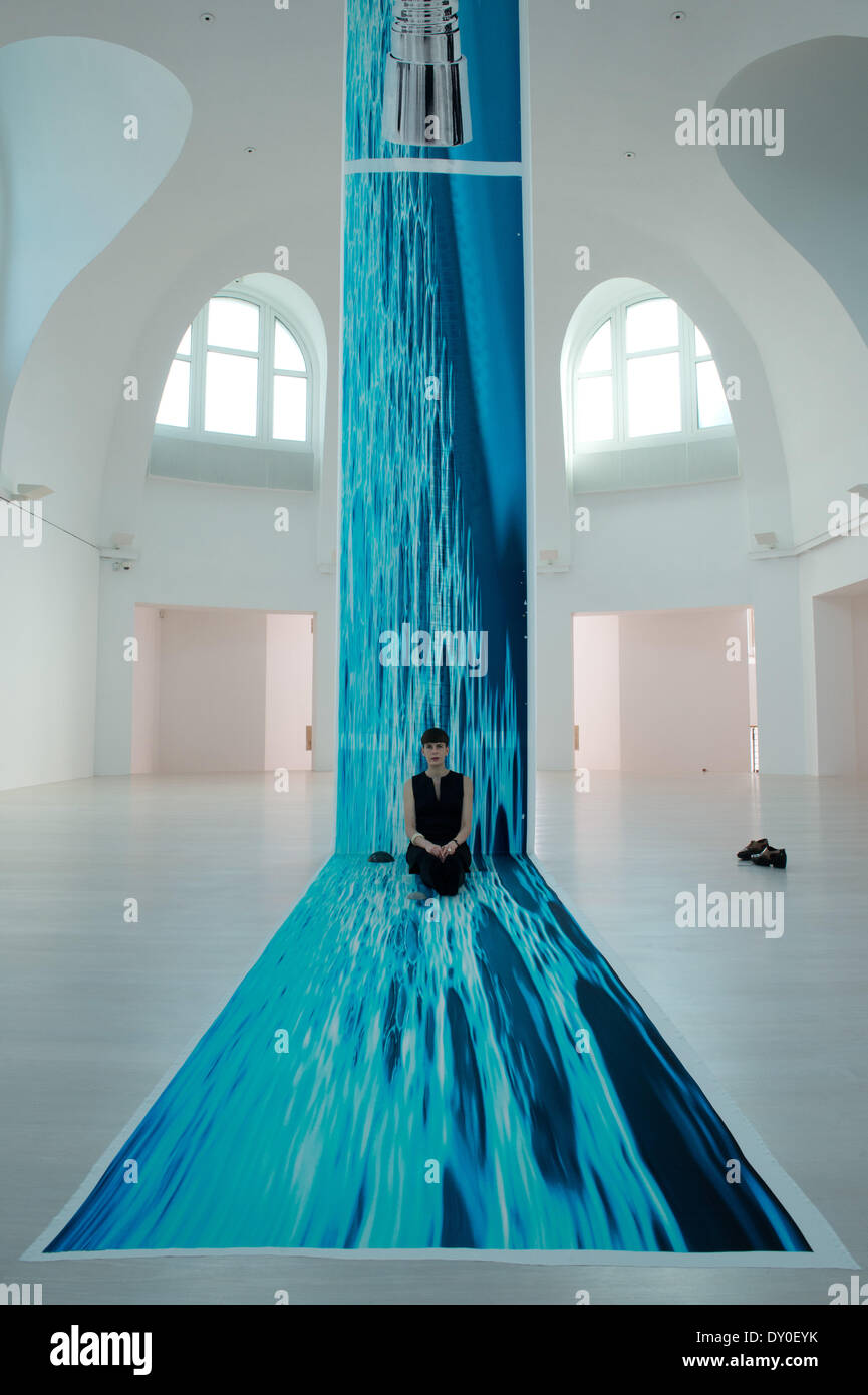 Hanover, Germany. 02nd Apr, 2014. British artist Alice Channer sits on ...