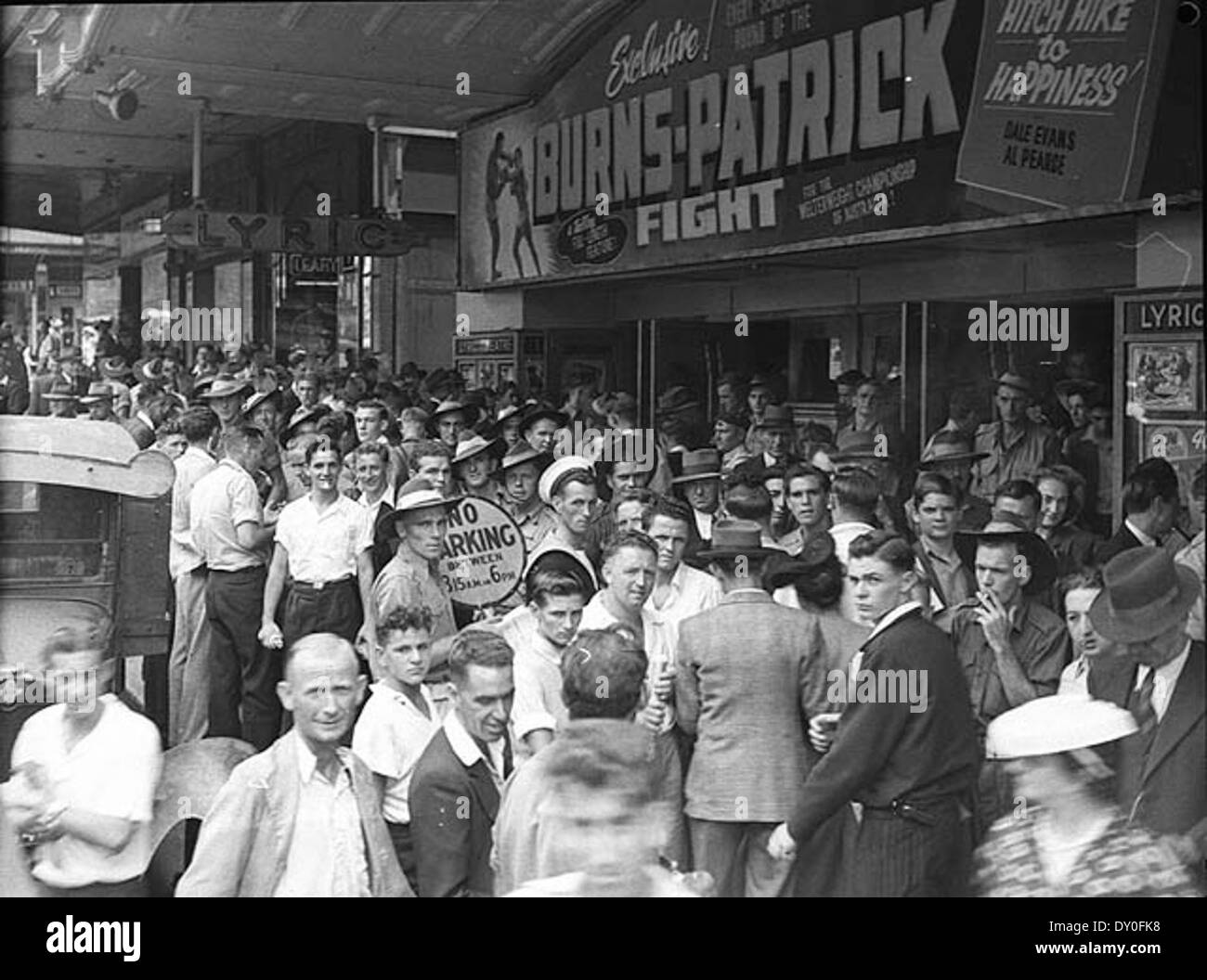 This newsreel captures a crowd attending the Burns vs Patrick boxing ...
