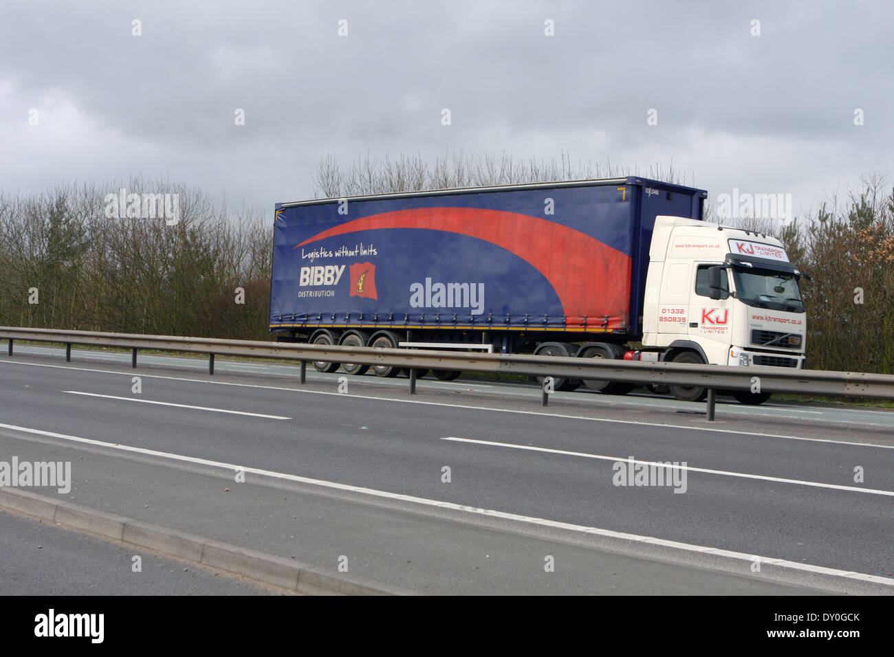 A Bibby curtainsided truck traveling along the A12 dual carriageway in ...