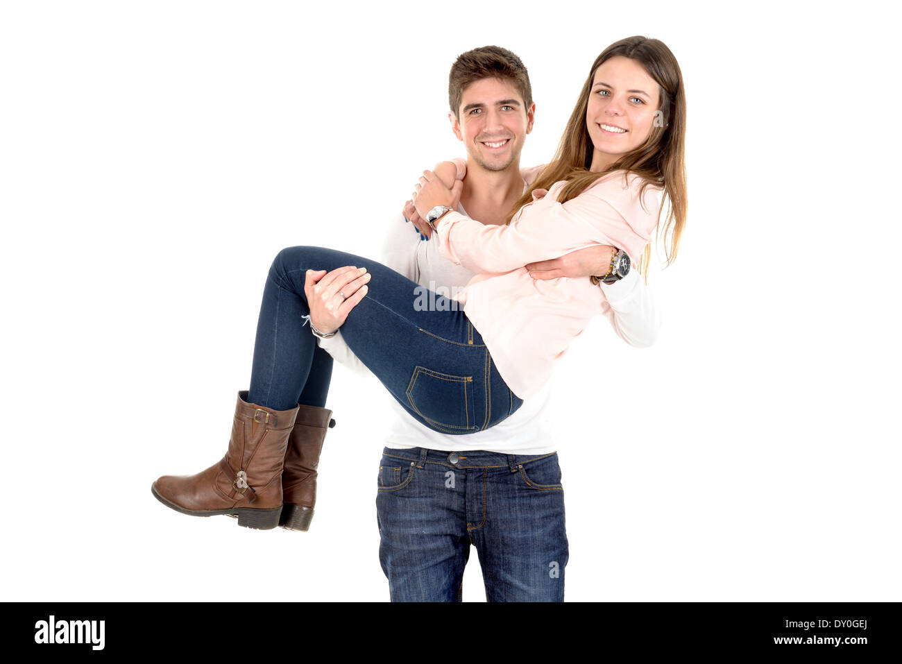 Young man carrying girlfriend isolated in white Stock Photo - Alamy