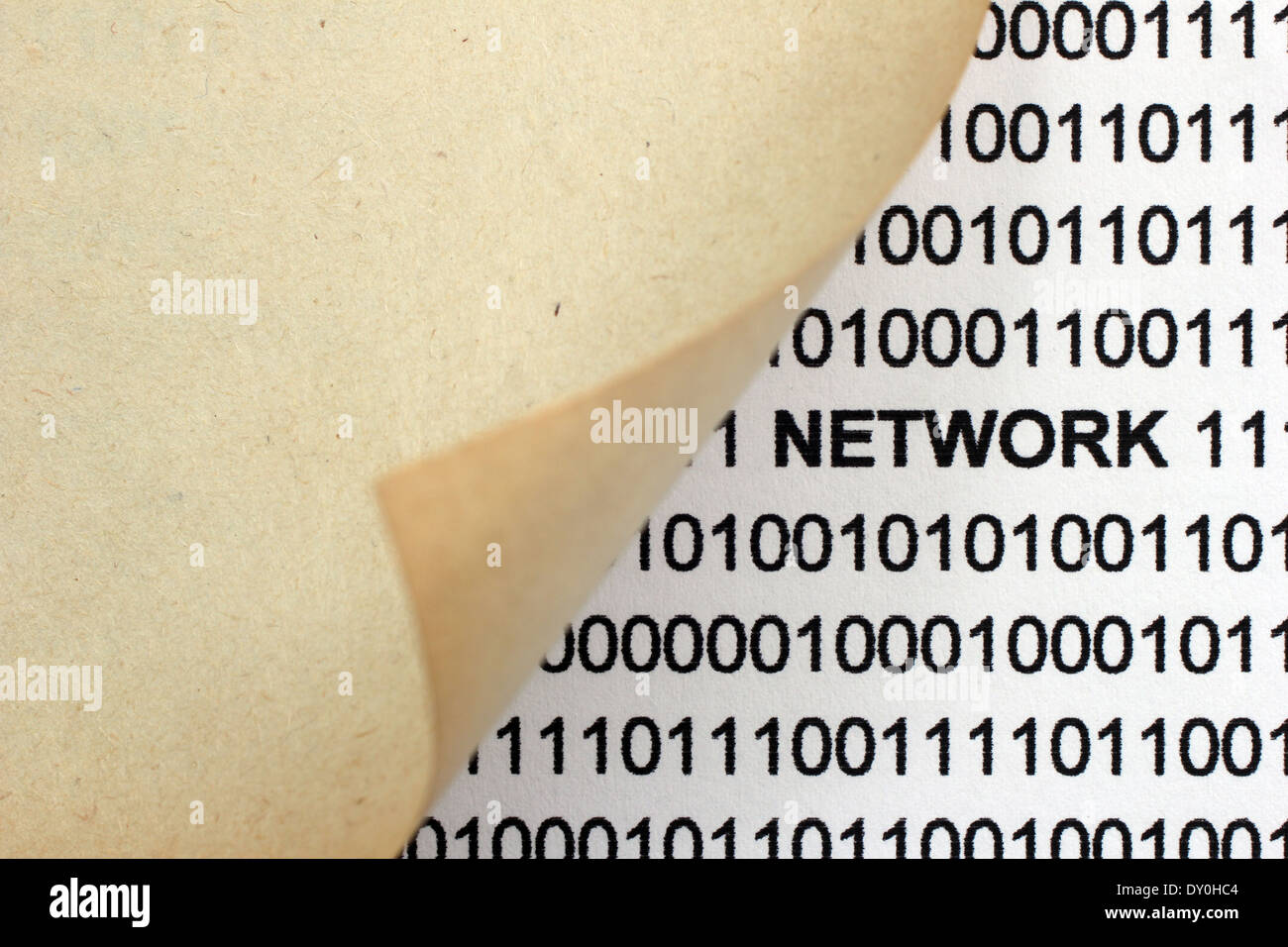 Network text behind paper Stock Photo - Alamy
