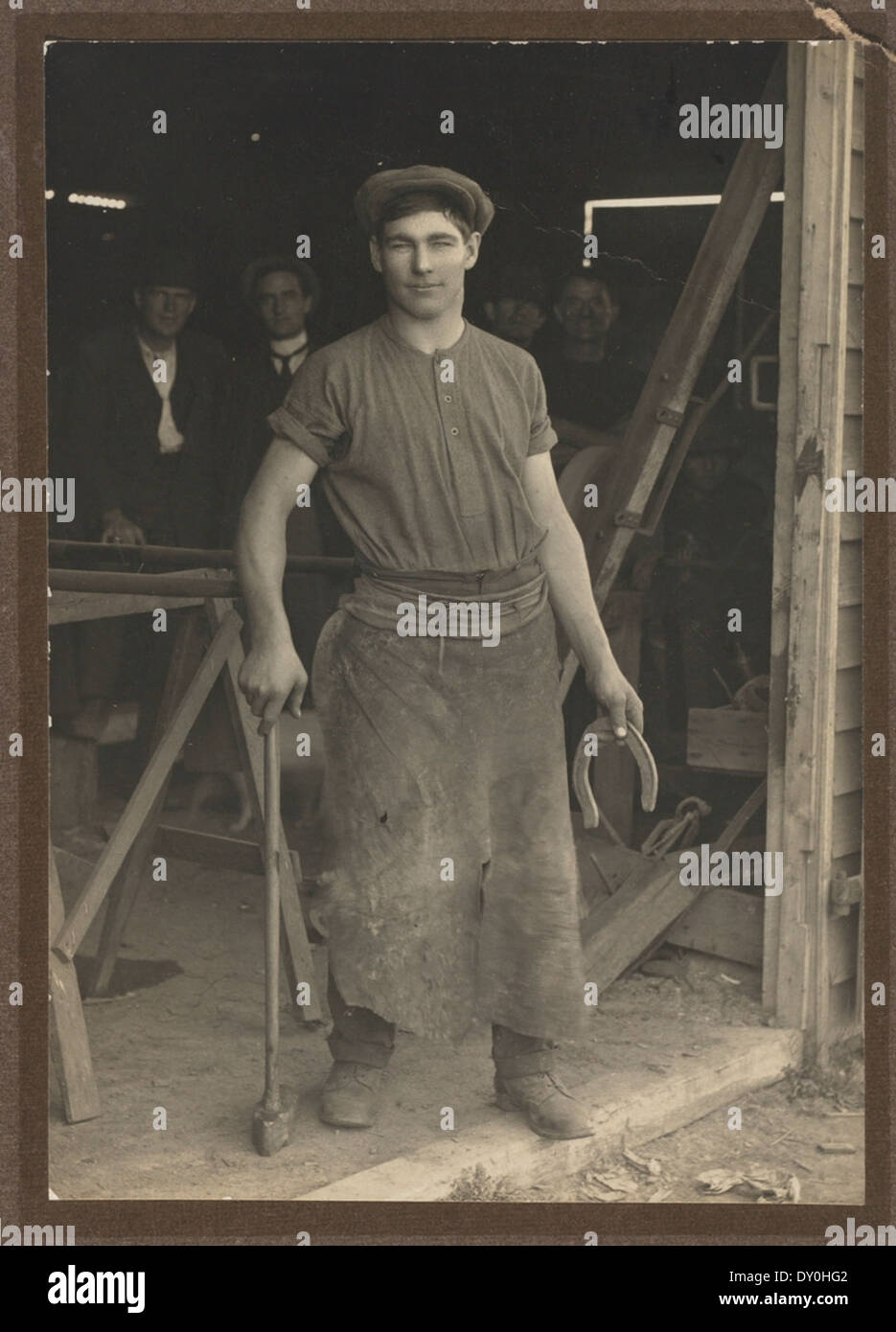Les Darcy, a renowned Australian boxer, is captured at the blacksmith ...